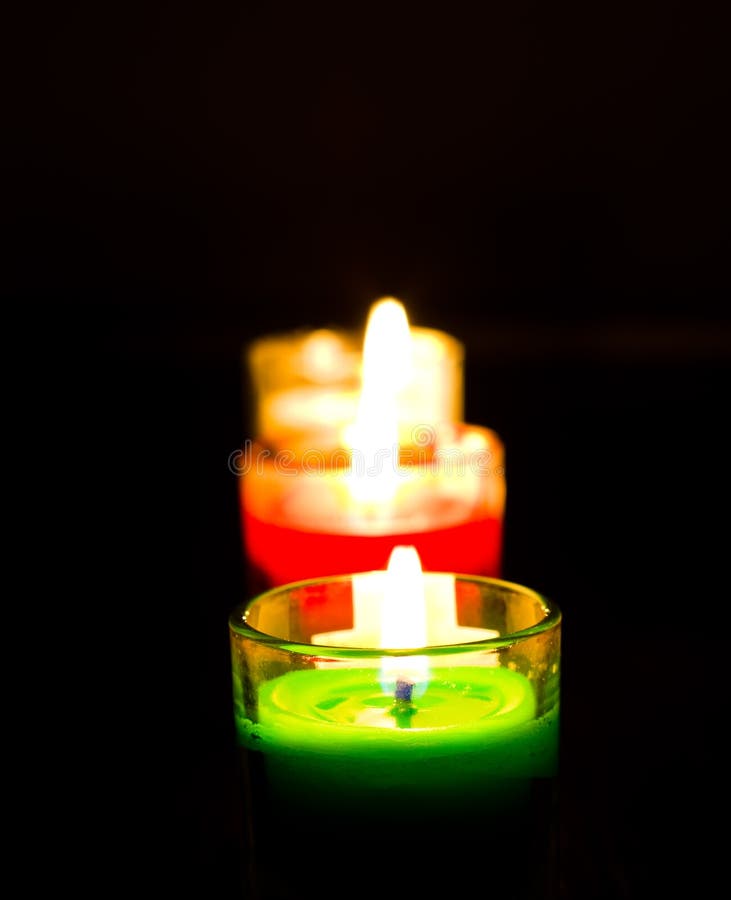 Burning candles with bokeh stock photo. Image of black - 28575912