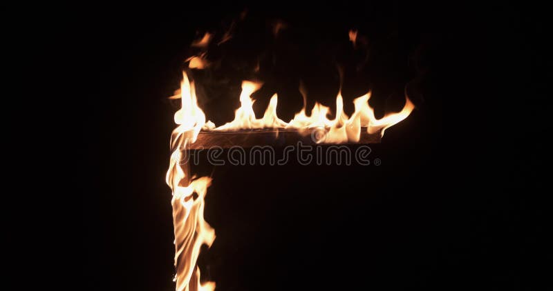 Burning Corner Board on a Black Background. Isolated Stock Footage ...