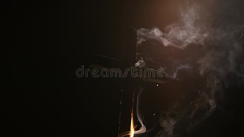 Burning cross falling down stock footage. Video of doom - 246939818