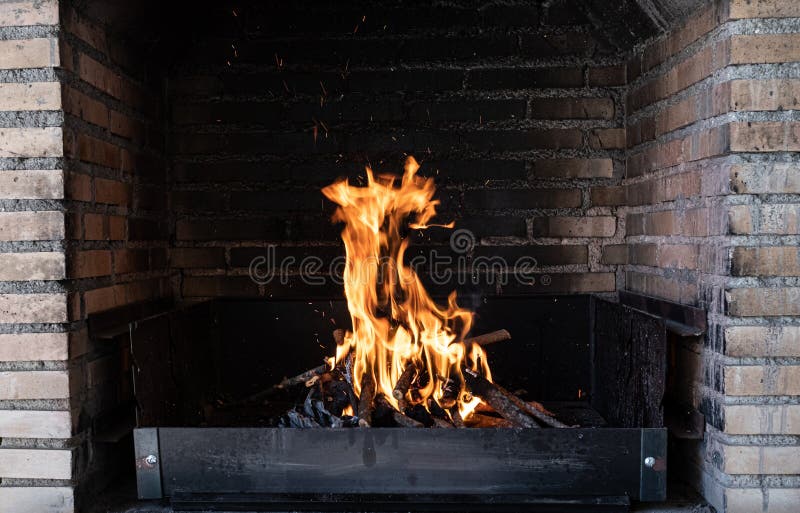 Burning Fire for a Barbecue Inside Brick Walls Stock Photo - Image of ...