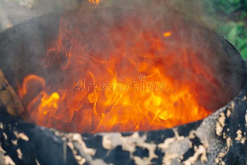 Bon Fire In A Barrel. Flames Sticking Out, Burning Wood Stock Photo ...