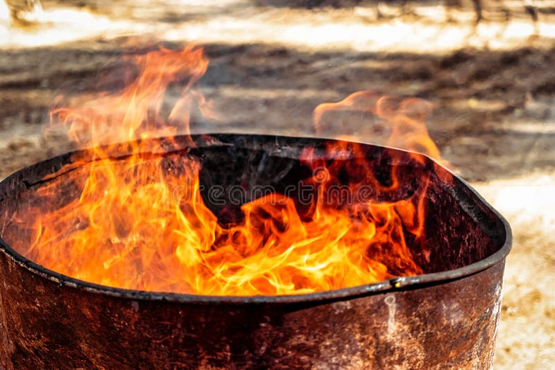Burning Fire in a Barrel Close-up. Bright Flame. Open Flame Heating ...