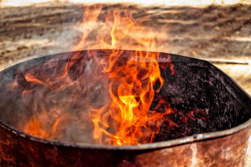 Burning Fire in a Barrel Close-up. Bright Flame. Open Flame Heating ...