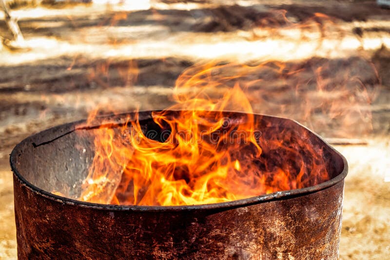 Burning Fire in a Barrel Close-up. Bright Flame. Open Flame Heating ...