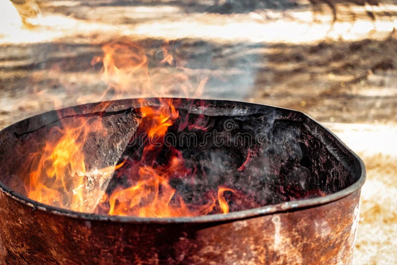 Burning Fire in a Barrel Close-up. Bright Flame. Open Flame Heating ...