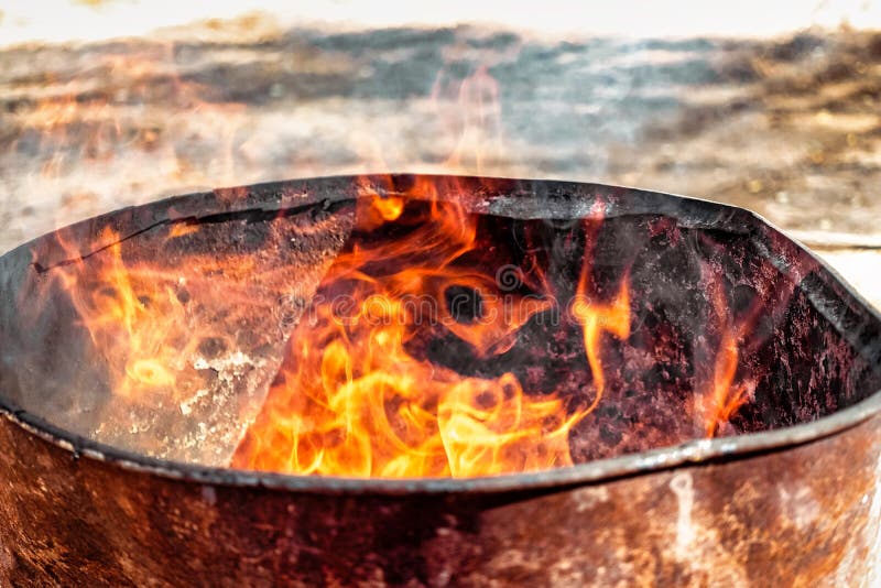 Burning Fire in a Barrel Close-up. Bright Flame. Open Flame Heating ...