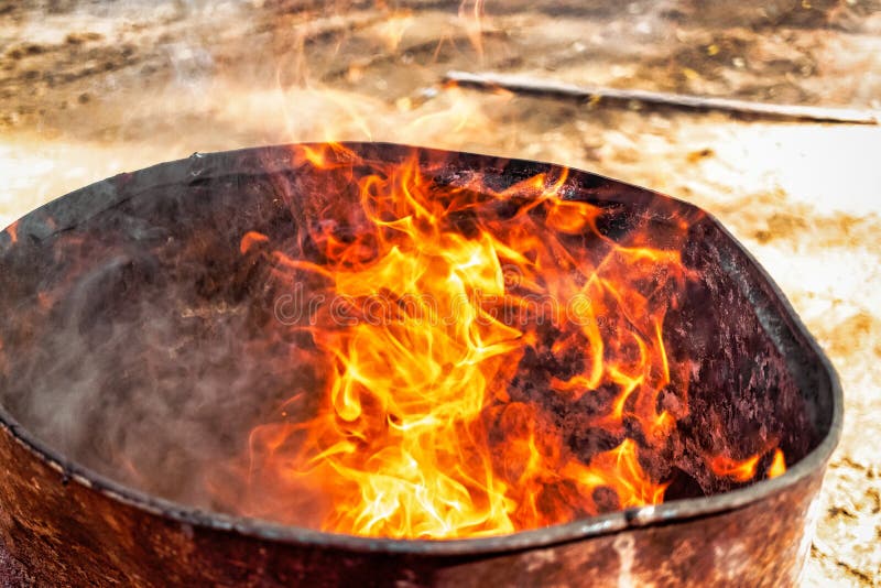 Burning Fire in a Barrel Close-up. Bright Flame. Open Flame Heating ...
