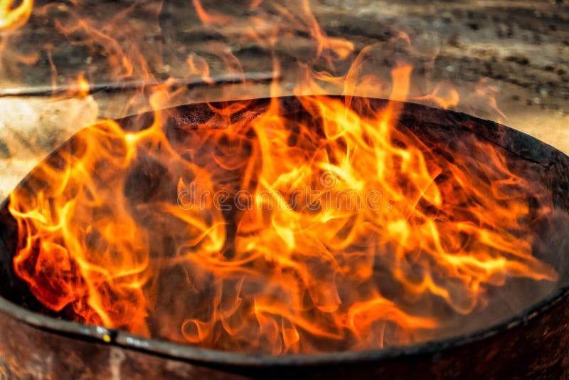 Burning Fire in a Barrel Close-up. Bright Flame. Open Flame Heating ...