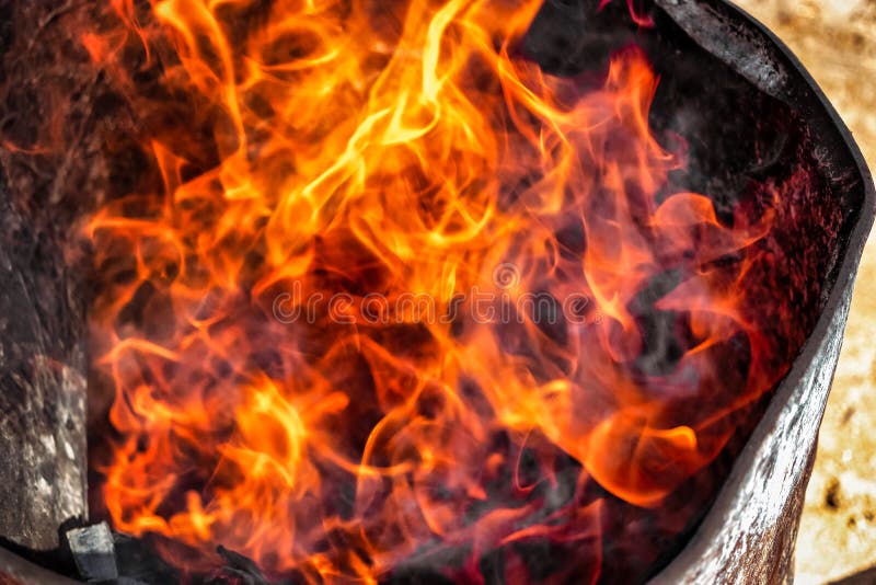 Burning Fire in a Barrel Close-up. Bright Flame. Open Flame Heating ...