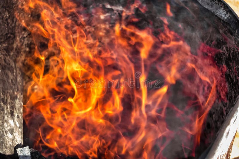 Burning Fire in a Barrel Close-up. Bright Flame. Open Flame Heating ...
