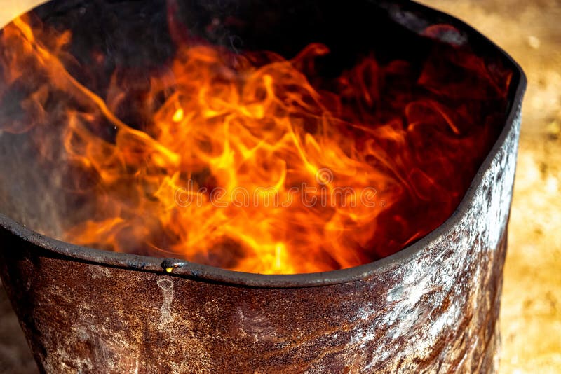 Burning Fire in a Barrel Close-up. Bright Flame. Open Flame Heating ...