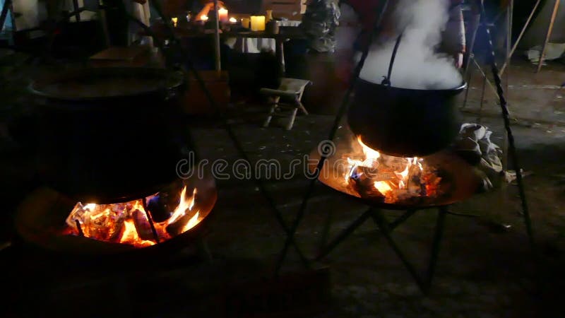 Burning Fire Campfire with a Large Copper Cauldron Stock Footage ...