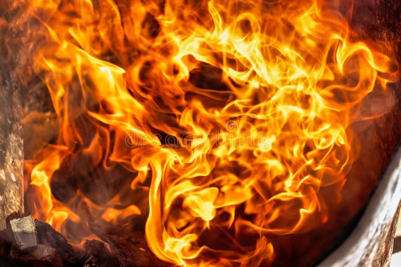 Burning Fire Close Up. Bright Orange and Red Flames on a Dark ...