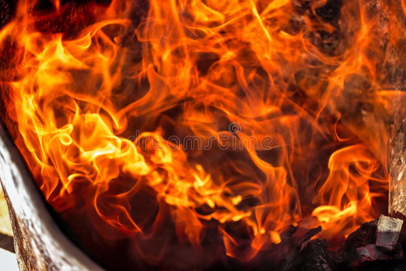 Burning Fire Close Up. Bright Orange and Red Flames on a Dark ...