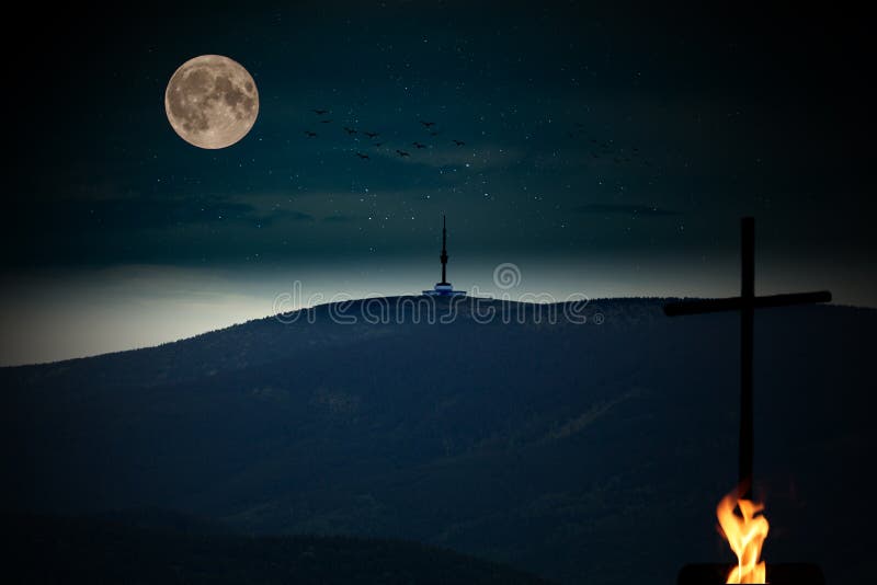 Burning Fire Cross with Night Sky and Realistic Full Moon Stock Photo ...