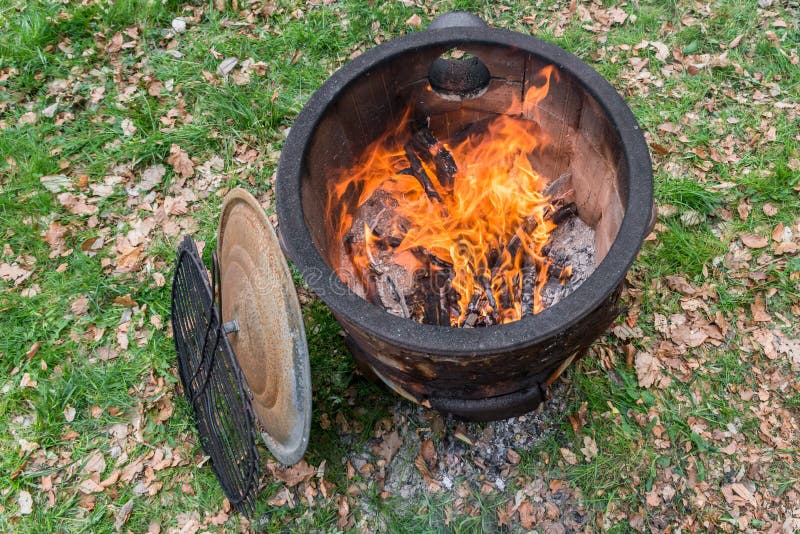 Burning fire in a fire pot stock photo. Image of springtime - 91518804