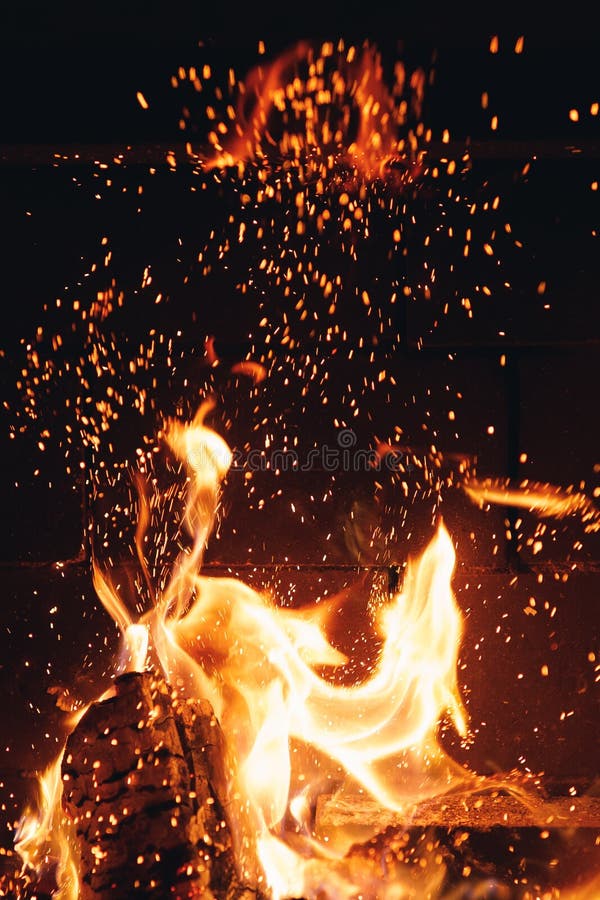 Burning Fire Logs with Sparks in the Fireplace Stock Image - Image of ...