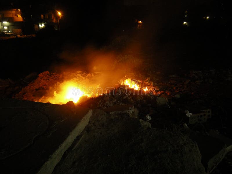 Burning fire in the night editorial photography. Image of glowing ...