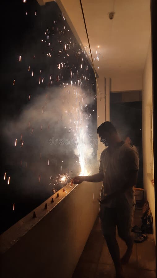 Burning Firecrackers in a Dark Outside of the House Editorial Stock ...