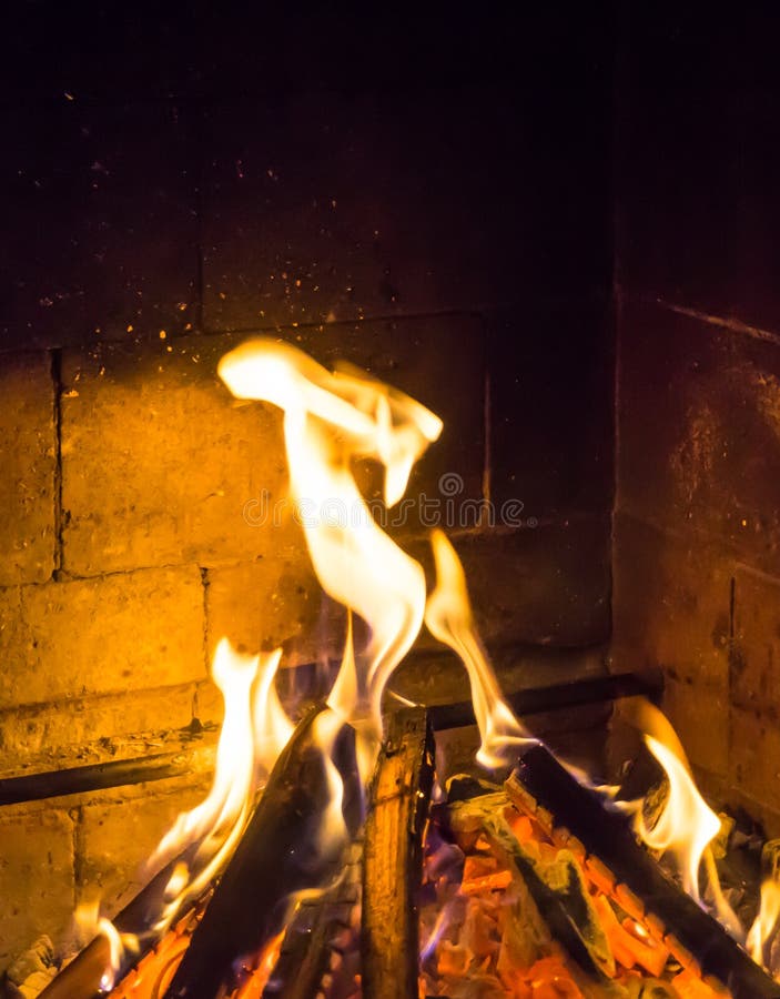 Warmth by the Fire stock photo. Image of roaring, blazing - 1608702