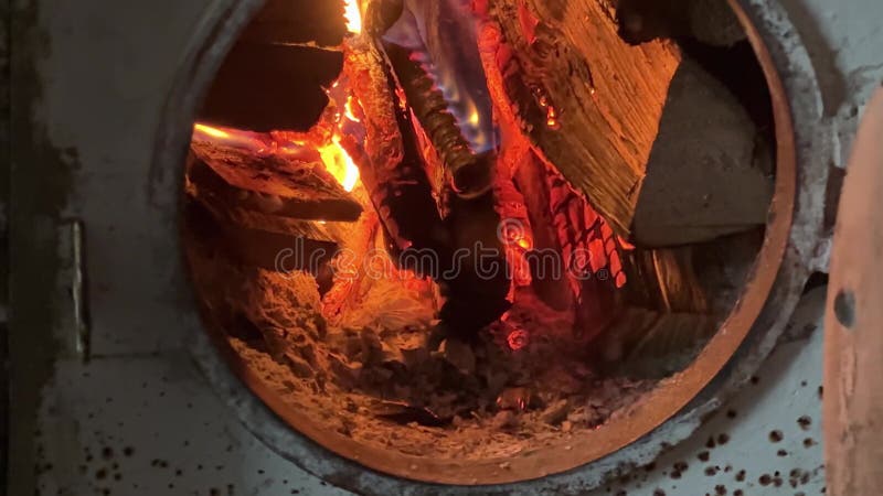 Burning Firewood in Masonry Heater Firebox, View through Open Door ...