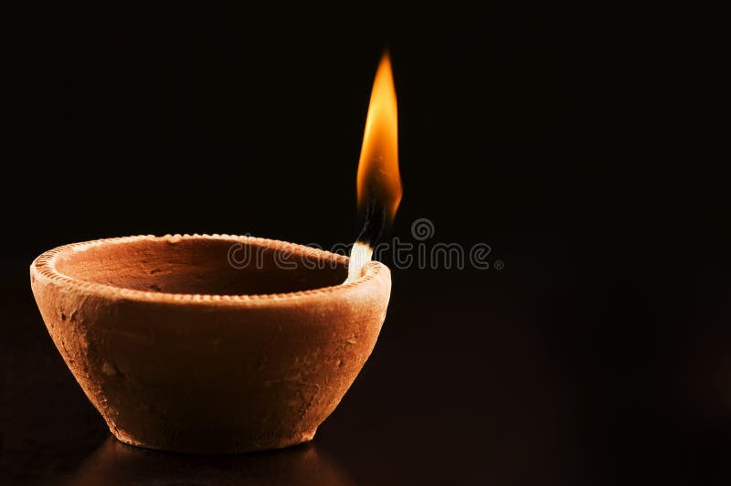Burning Flame in Earthern Lamp Stock Image - Image of deep, peace: 9279505