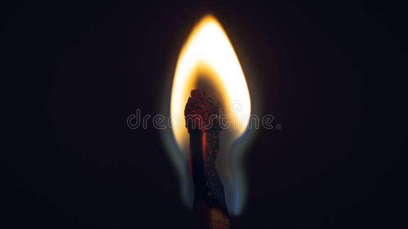 Burning Flame on an Isolated Match Stick on a Black Background Stock ...