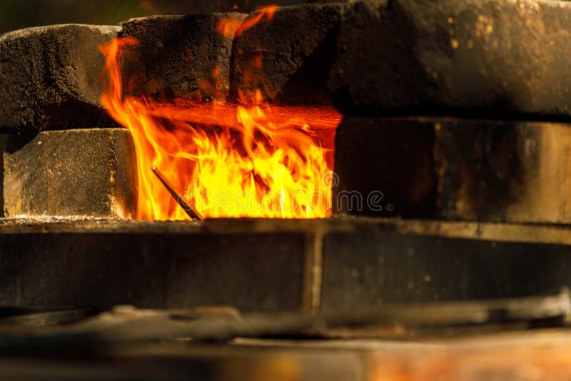 A Burning Forge Made of Bricks in Nature Stock Photo - Image of forge ...