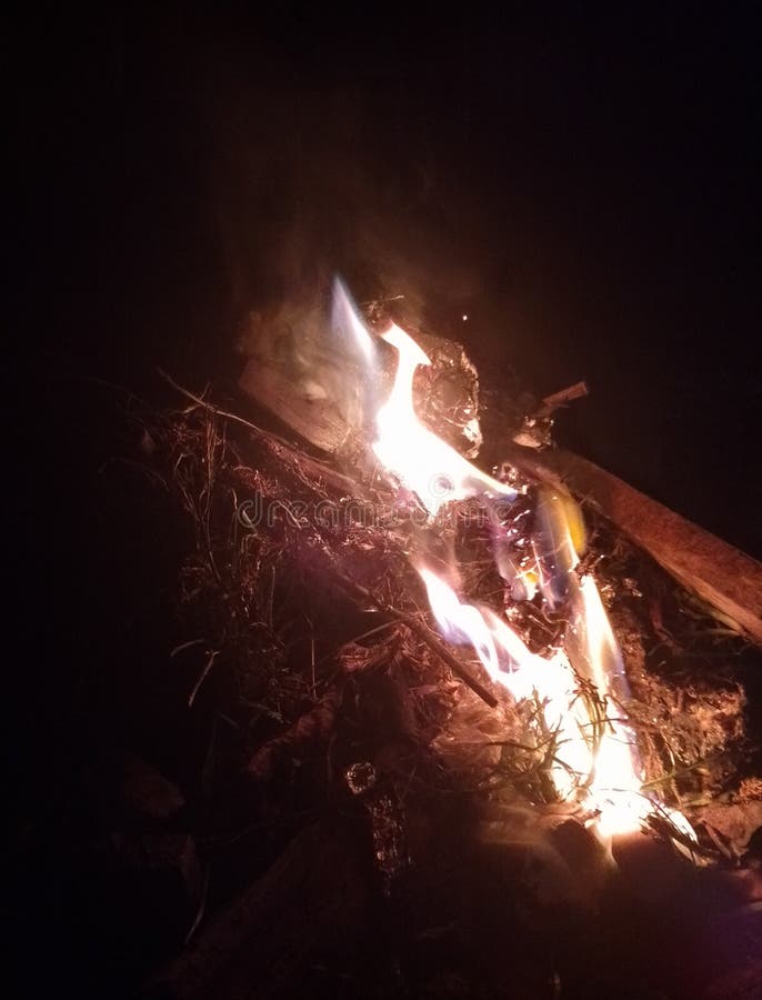 Burning garbage at night stock image. Image of darkness - 261786083