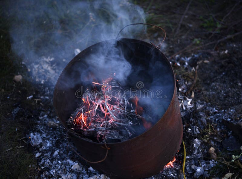 Burning Garbage in the Tank. Incineration of Garbage in an Iron Bucket ...