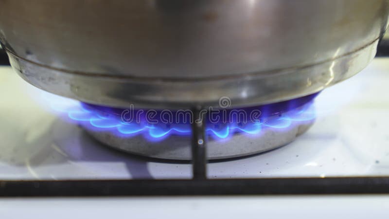 Burning Gas Burner on the Stove with a Pot. Stock Footage - Video of ...
