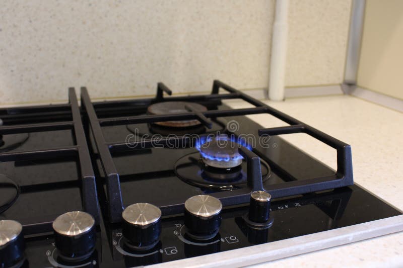 Burning Gas Stove Burner, Black Stove in the Kitchen, Blue Fire Stock ...