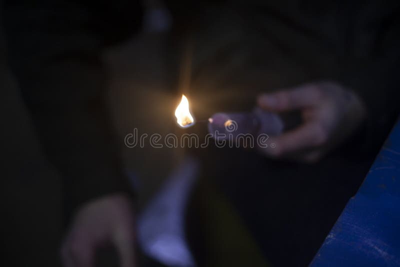 Burning glue on a syringe. stock photo. Image of gluing - 186158608