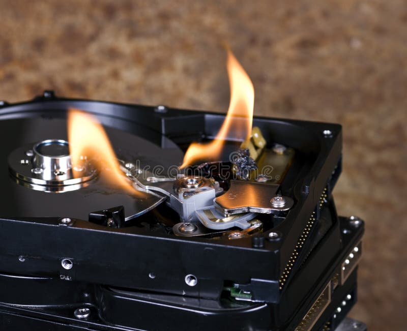 Burning hard drive stock photo. Image of equipment, block - 20735350