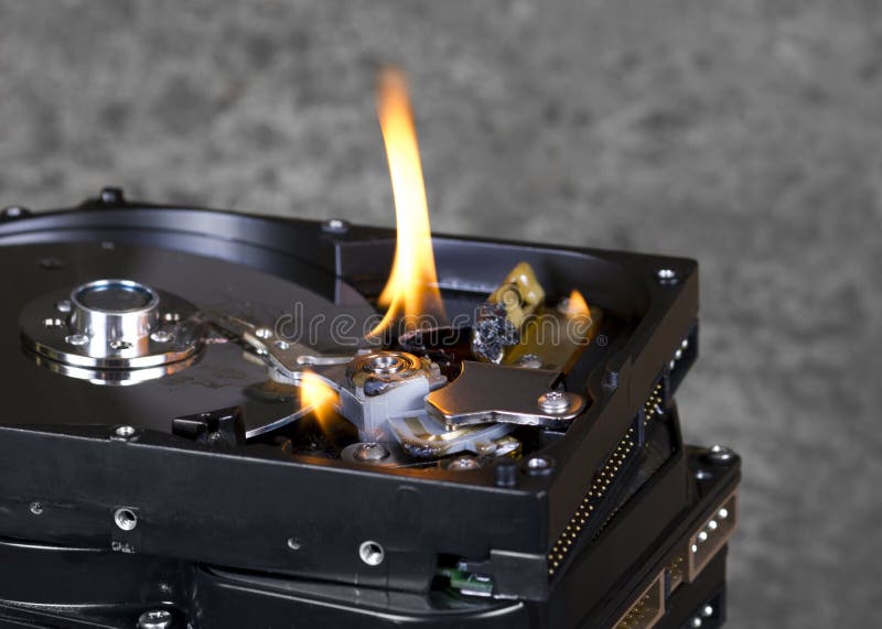 Hard disk drive burning stock photo. Image of broken - 27333138