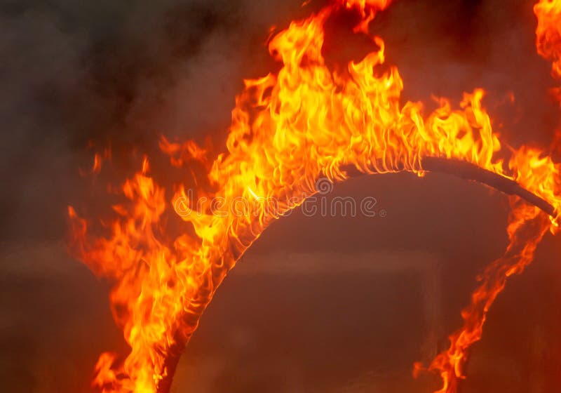 Burning hoop in nature stock photo. Image of inferno - 180955200