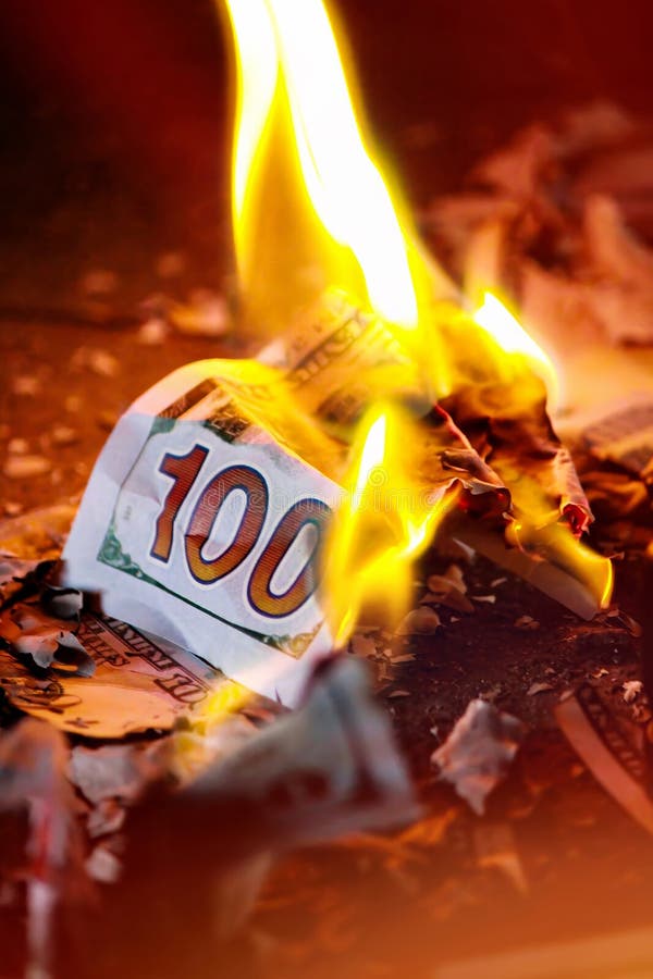 Burning Hundred Dollar Bill in Dramatic Close-Up with Bright Flames and ...