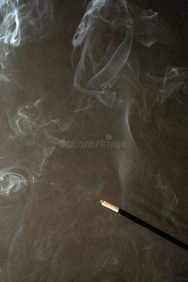 Burning Incense Sticks with Smoke on Dark Background Stock Photo ...