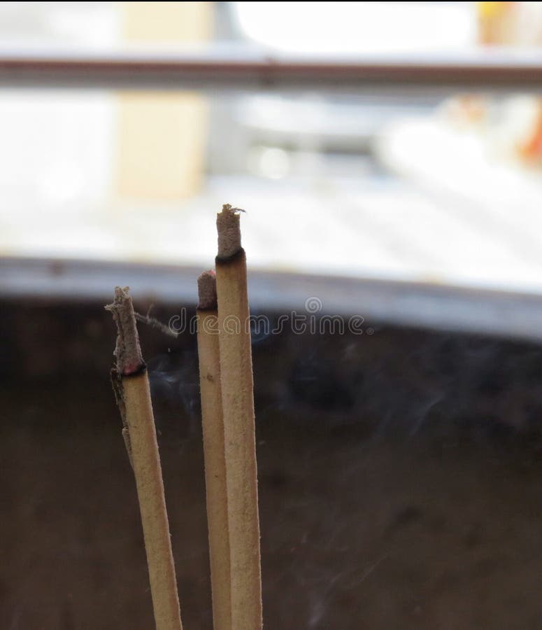 Burning incense sticks stock photo. Image of buddha, sticks - 74577368