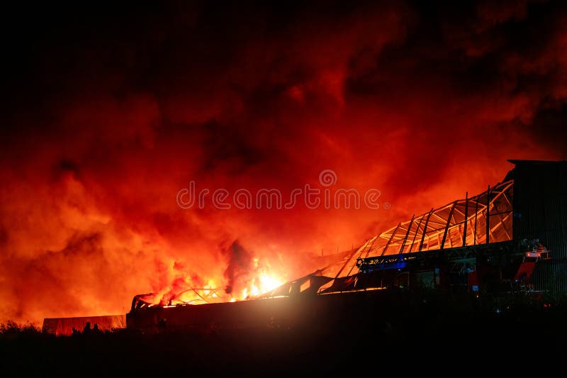 Burning Industrial Building. Big Blaze at Night Stock Photo - Image of ...