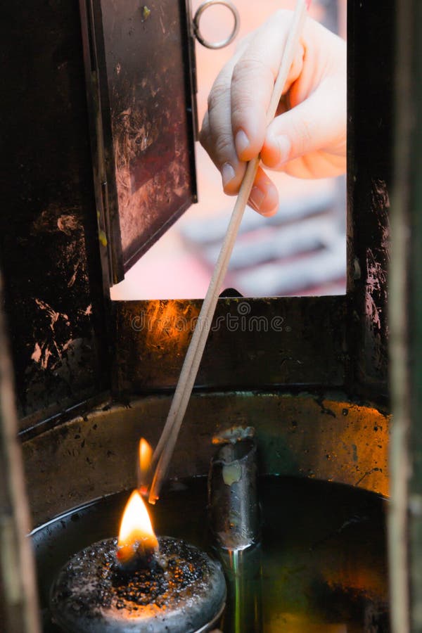 Burning joss stick stock image. Image of fire, container - 64517997