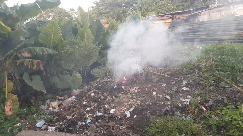 Burning Junk Pollutes the Environment Stock Video - Video of junk ...