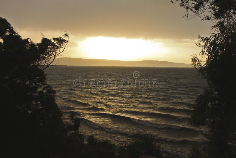 Burning Lake stock image. Image of sunset, yellow, clouds - 94465717