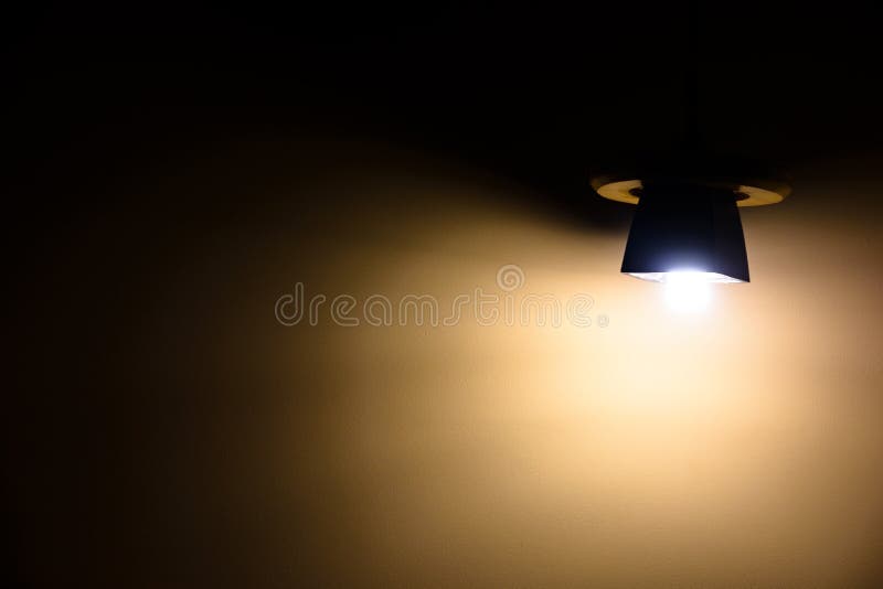 Burning Lamp Lights the Wall Stock Image - Image of spot, wall: 269117257