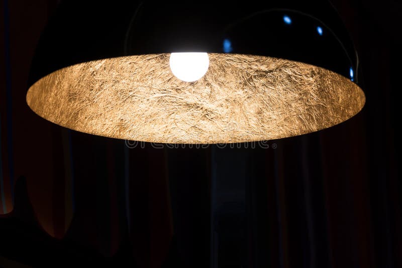 Burning Lamp Under a Shade in a Dark Black Room Stock Photo - Image of ...
