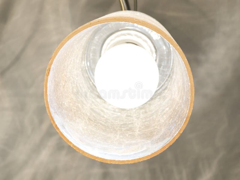A Burning Light Bulb in the Lamp Closeup. Bottom View Stock Image ...