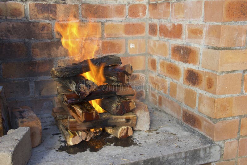 Burning Logs stock photo. Image of flame, energy, fireplace - 294710