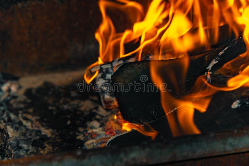 Burning Logs for Kindling a Fire, Flame and Smoke on Fire. Logs in a ...