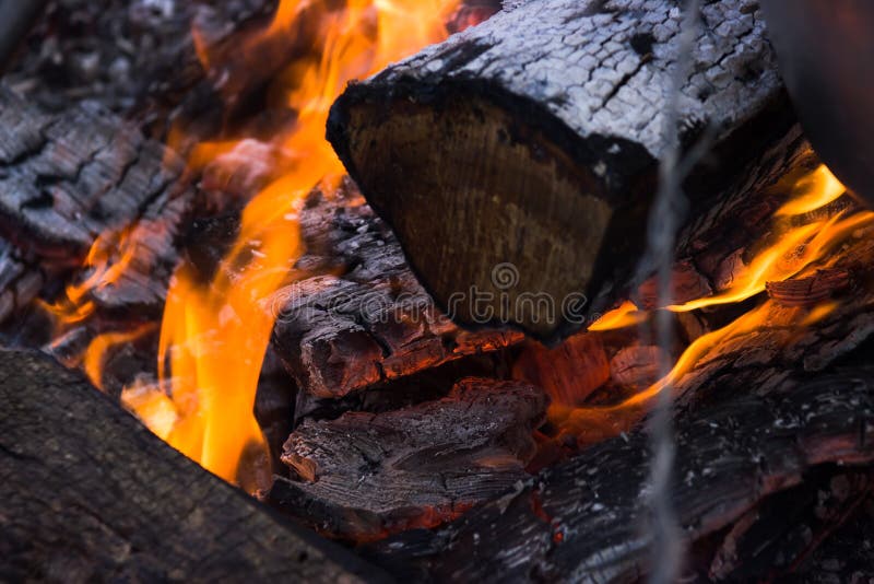 Burning logs at fire place stock photo. Image of burnt - 85356184