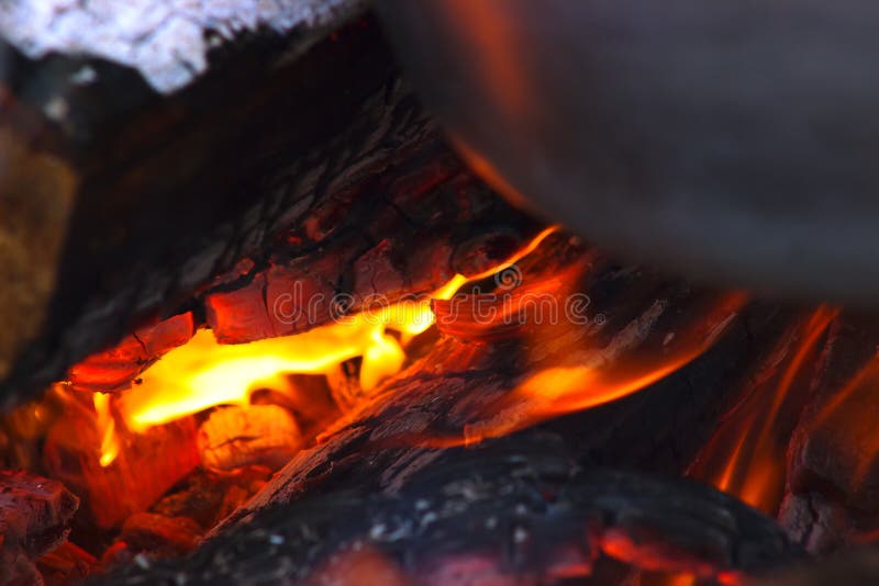 Burning logs at fire place stock photo. Image of macro - 85358668